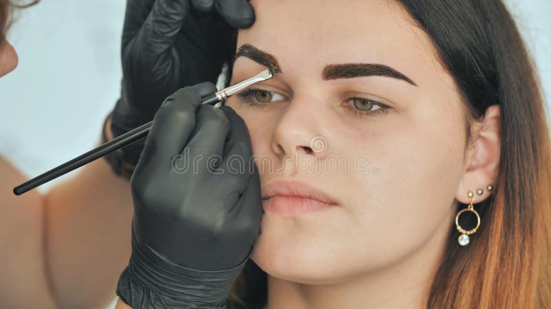 Permanent Makeup. Permanent Tattooing of Eyebrows Stock Photo - Image ...