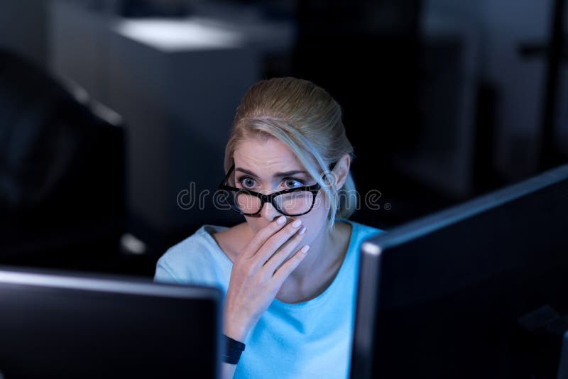 Perplexed Female Programmer Working in the Office Stock Photo - Image ...
