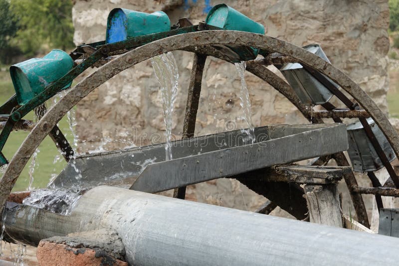 Persian wheel on a well stock image. Image of deep, rural - 207964645