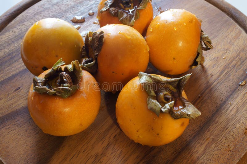 Six Persimmons Stock Photos - Free & Royalty-Free Stock Photos from ...