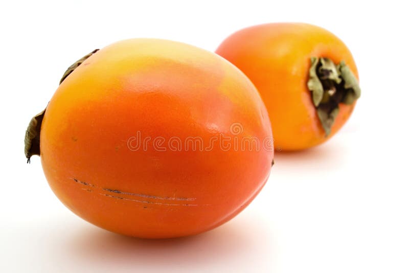 Persimon isolated stock photo. Image of pair, yellow - 11463838