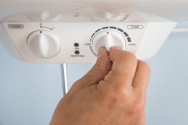 Person Adjusting Temperature of Electric Boiler Stock Image - Image of ...