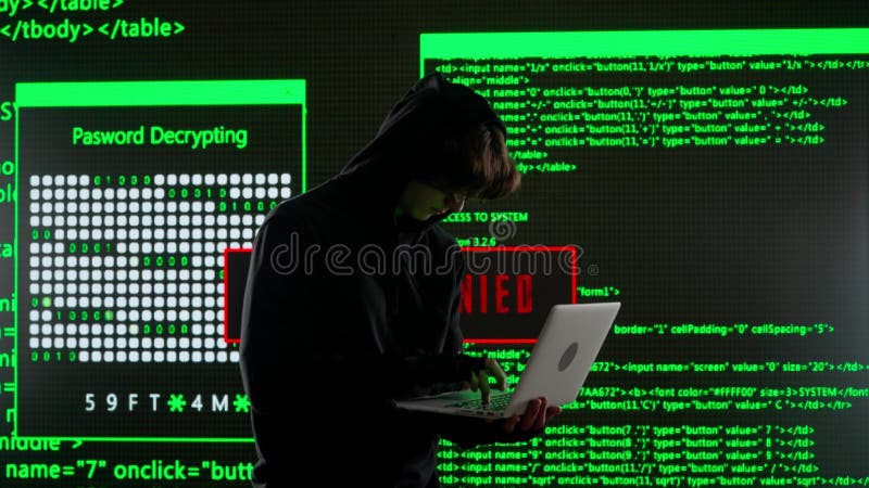 Person Against Big Digital Wall in Studio. Man Hacker with Laptop ...