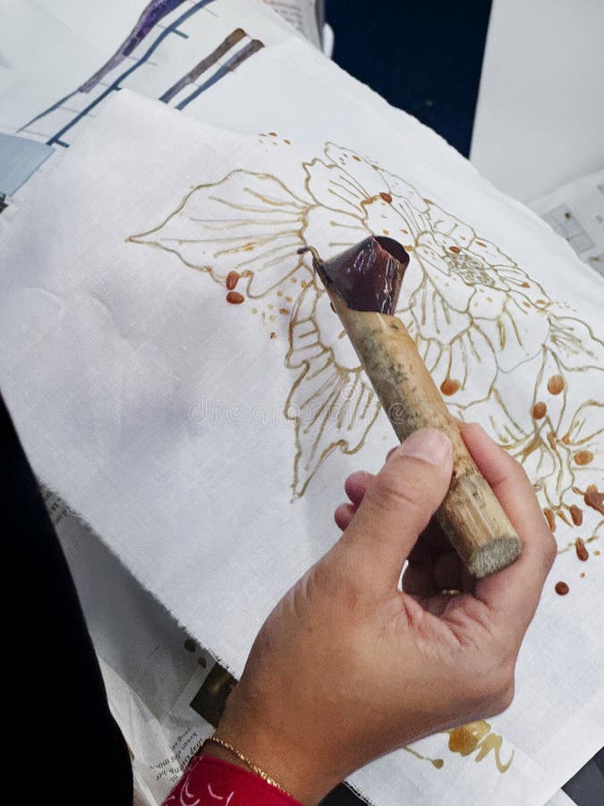 A Person is Applying Wax Using a Tjanting (canting) Batik Stock Photo ...
