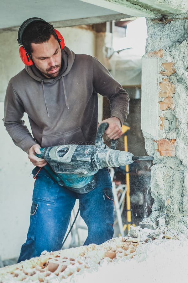Person with an Automatic Hammer Stock Photo - Image of handyman ...