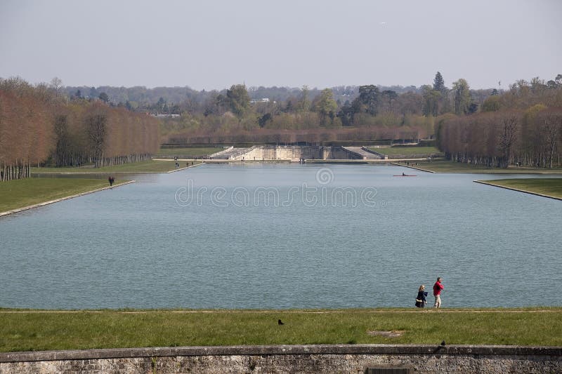 Person on the Bank of the River Editorial Image - Image of clouds ...