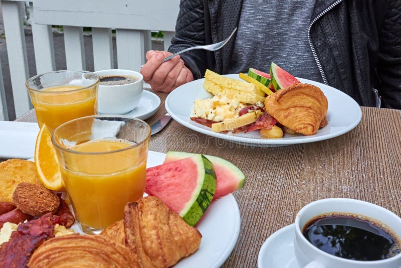 Person at a Breakfast Table Stock Image - Image of croissant, jacket ...