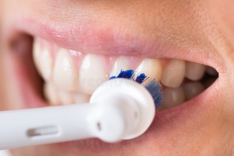 Person brushing teeth stock image. Image of health, detail - 55364541