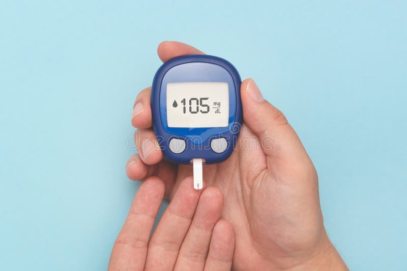 Person Checking Blood Sugar Level with Glucometer Stock Image - Image ...