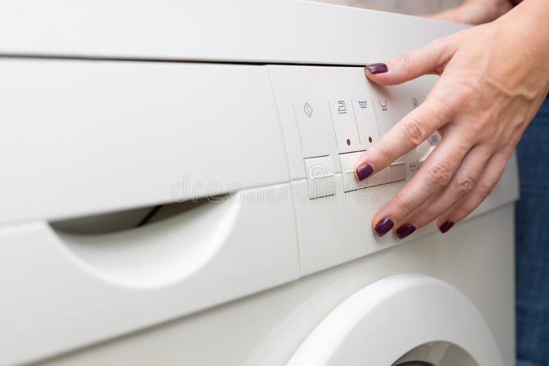 A Person Chooses a Washing Mode with a Switch. Stock Image - Image of ...