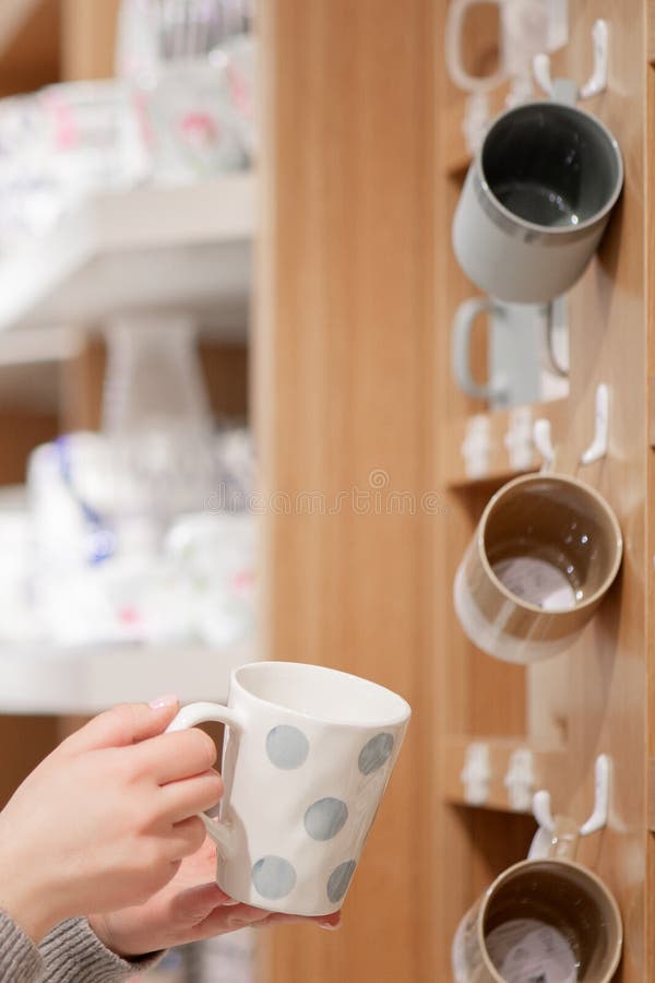 Person Choosing New Kitchenware in the Shopping Mall Stock Photo ...