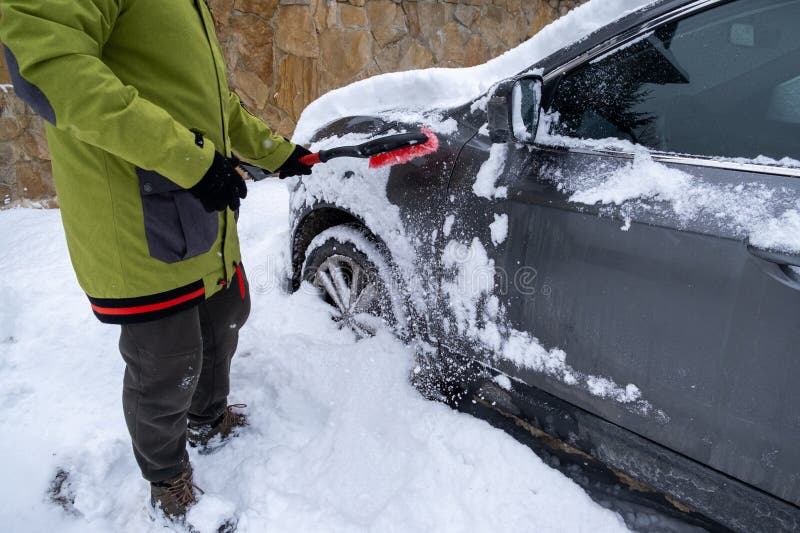Person Clearing Snow from Car in Winter Landscape Stock Photo - Image ...