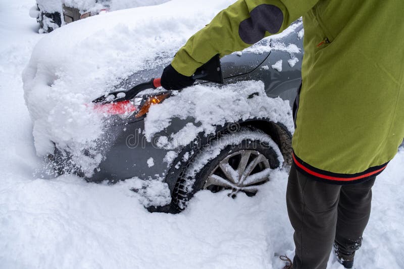 Person Clearing Snow from Car in Winter Landscape Stock Photo - Image ...
