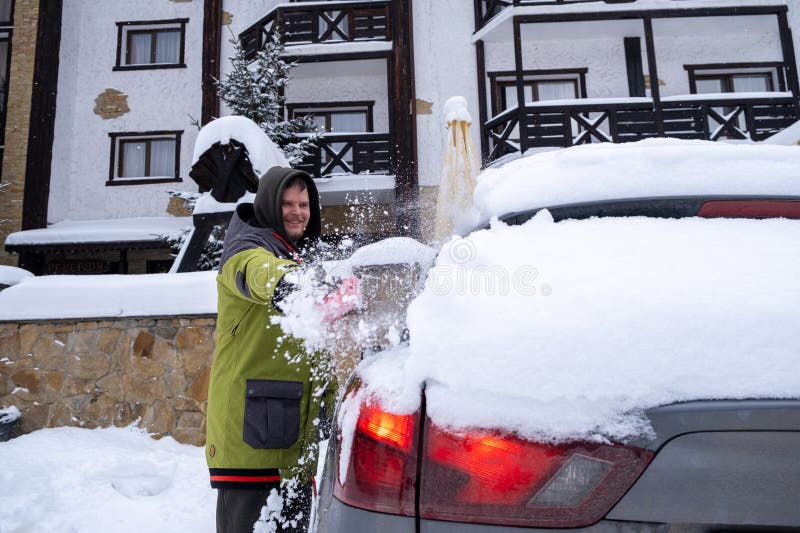 Person Clearing Snow from Car in Winter Landscape Stock Photo - Image ...
