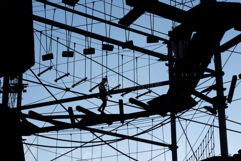Person Climbing on High Ropes Stock Photo - Image of balance, blue ...