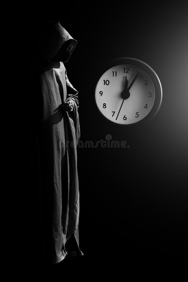 Person in a Cloak in with a Clock. Stock Photo - Image of fearful ...