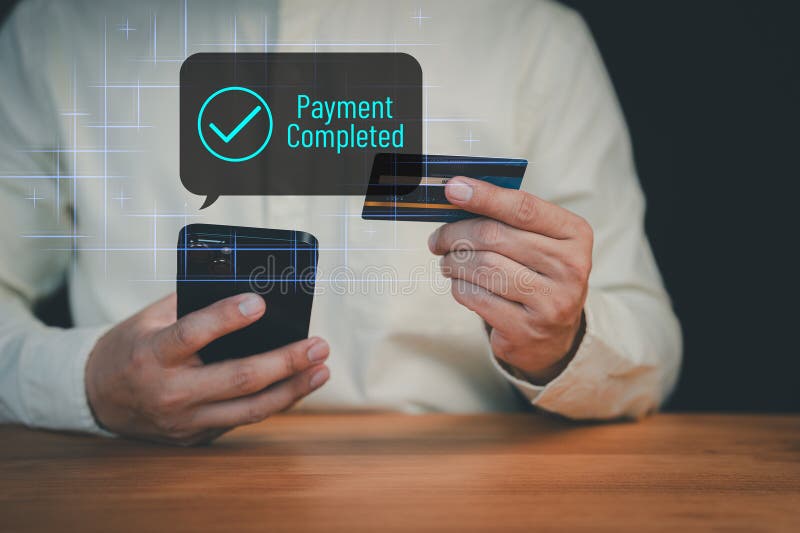 Person Completing Online Payment Using a Credit Card on Mobile Phone ...
