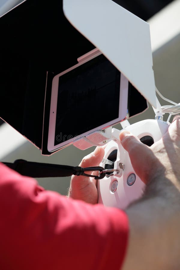 Person controlling a drone stock image. Image of phantom - 55794059