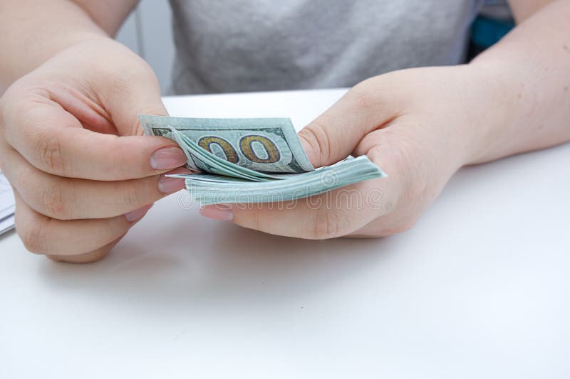 A Person Counting a Wad of Money Stock Photo - Image of economic ...