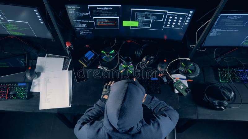 A Person Cracking Computer. Hacker Cracks System, Using Computer. Stock ...