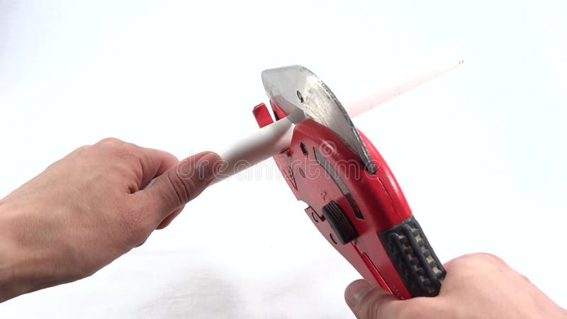 Person cutting pvc pipe stock video. Video of isolated - 39954171