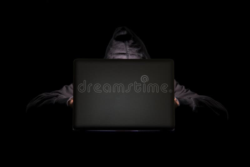 A Person in a Dark Room Using a Laptop, Internet Phishing, Hacking ...