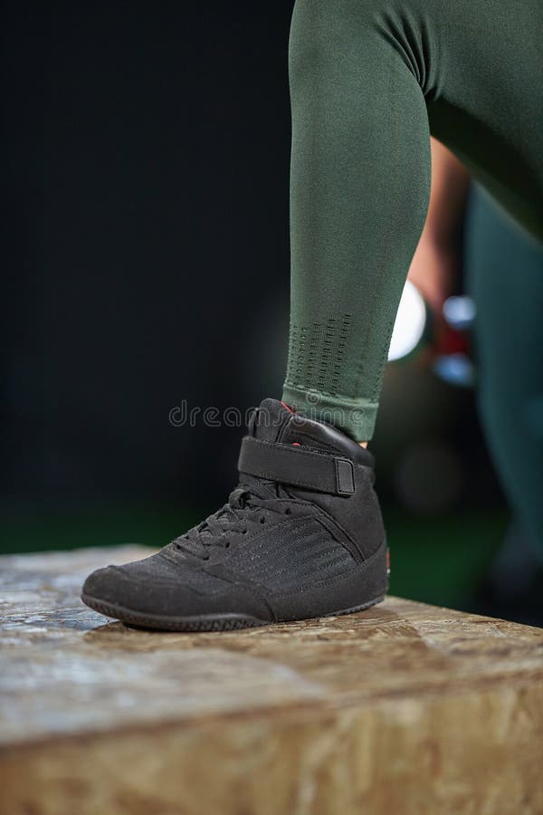 Person Demonstrates Strength Training Techniques while Wearing ...