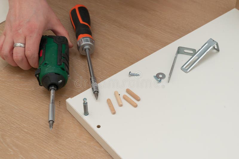 Person Working Diligently Furniture Using Screwdriver Stock Photos ...