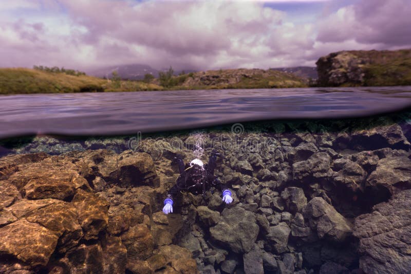 Person Diving Underwater in Silfra, Iceland Stock Image - Image of ...