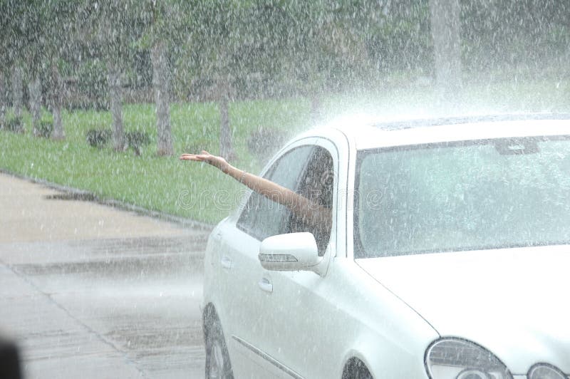 Person Driving Car In Rain Royalty Free Stock Photos - Image: 22245368