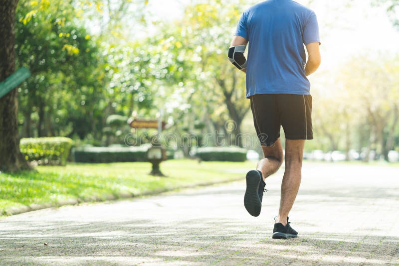 Person Exercise Jogging in Park in the Morning Stock Photo - Image of ...
