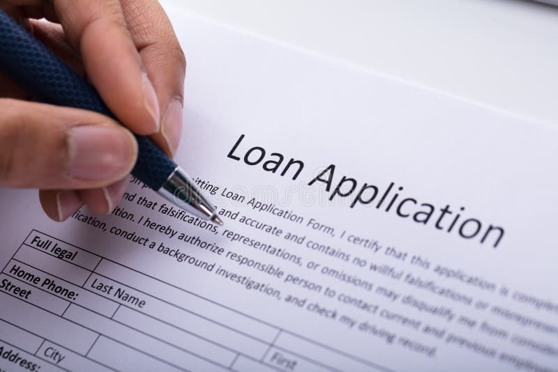 Person Filling Loan Application Form Stock Photo - Image of economic ...