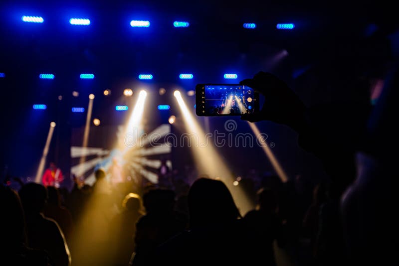 Person Filming a Concert with a Smartphone Stock Photo - Image of ...