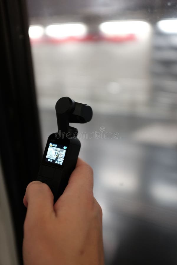 Person Filming in a Train Using a Handheld Camera Stock Image - Image ...