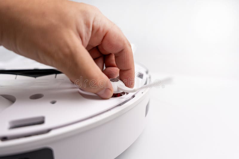 A White Device with a Black Screen Sits on a Green Counter Stock Photo ...