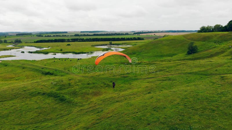A Person is Flying the Parawing in a Top View Stock Footage - Video of ...