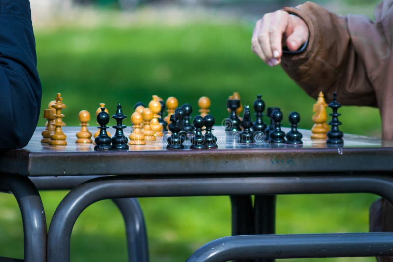 Person Getting Ready To Take a Step in a Chess Game with a Blurred ...