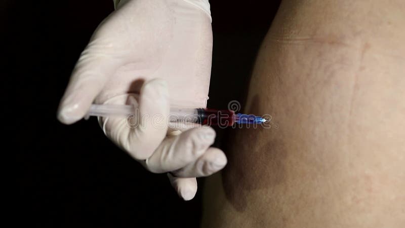 A Person Gives Himself an Intramuscular or Subcutaneous Injection Stock ...
