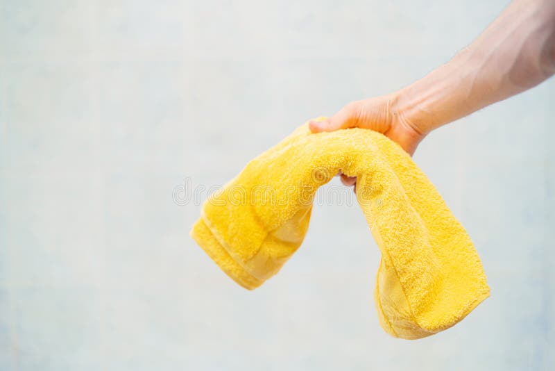 Person Hand Holding a Color Towel before Taking a Bath Stock Image ...