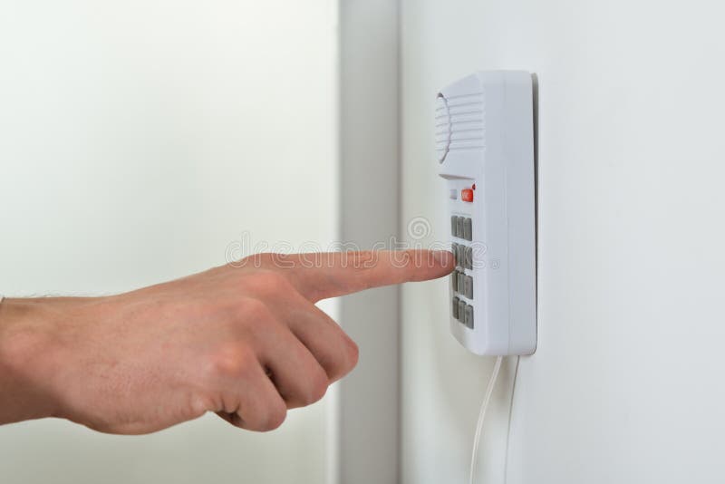 Person Hand Pressing Button on Security System Stock Image - Image of ...