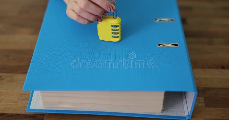 Person Hand Put Code Padlock on Folder with Paperwork Stock Video ...