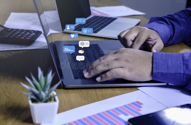 Person Hand Using a Laptop Computer with Social Media Marketing Concept ...
