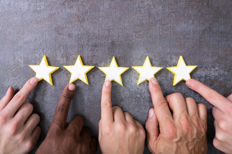 Person Hands Aligning Five Star Rating Icons Stock Photo - Image of ...