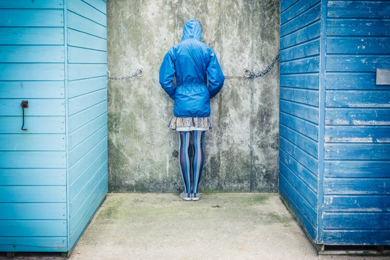 Woman Trapped Against A Wall Stock Photo - Image of horizontal, angle ...