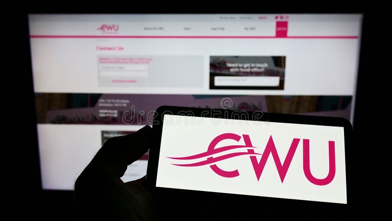 Person Holding Cellphone with Logo of British Communication Workers ...