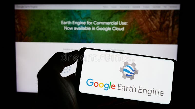 Person Holding Cellphone with Logo of Software Product Google Earth ...