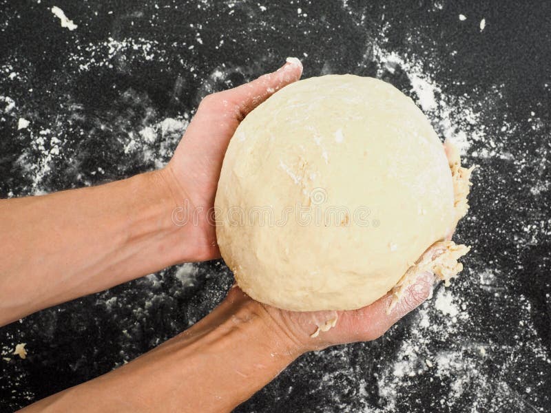 Person Holding a Dough after Proofing Stock Photo - Image of board ...