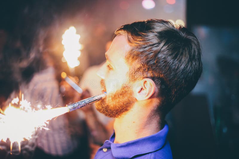 Person Holding Fireworks By Mouth Picture. Image: 117420870
