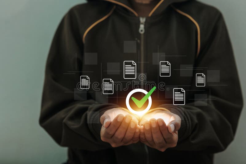 A Person is Holding a Glowing Green Check Mark. the Check Mark is ...