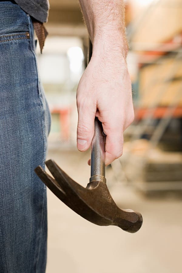 Person holding a hammer stock photo. Image of gentleman - 36095428